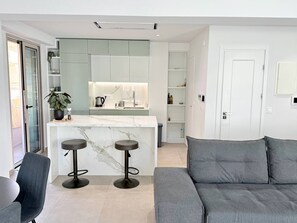 Apartamento, 1 quarto, varanda, Vista para a cidade | Sala de estar