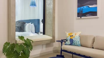 Suite Elite | Cofre no quarto, cortinas/cortinados opacos, ferro/tábua de engomar