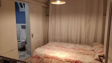 Apartamento Familiar, 2 quartos, Vista para a cidade | 2 quartos, cofre no quarto, cortinas/cortinados opacos