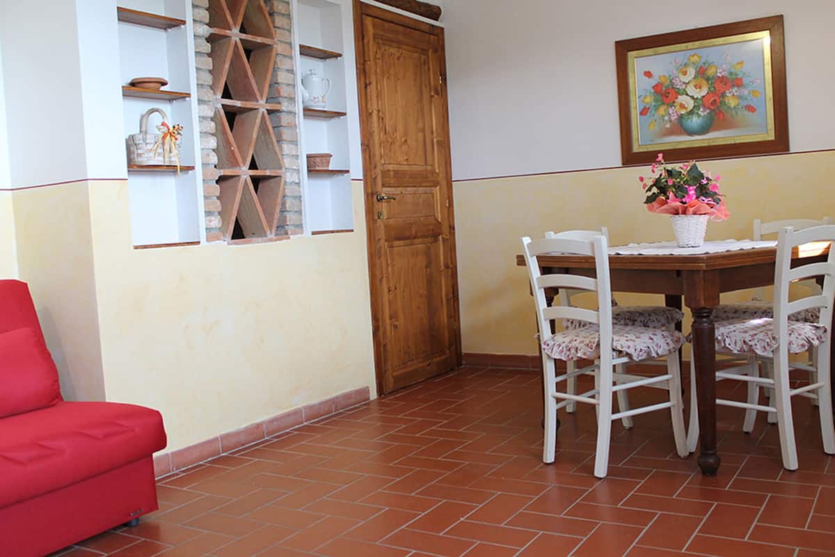 Suíte júnior, 1 cama Queen, vista para a colina | Área de estar