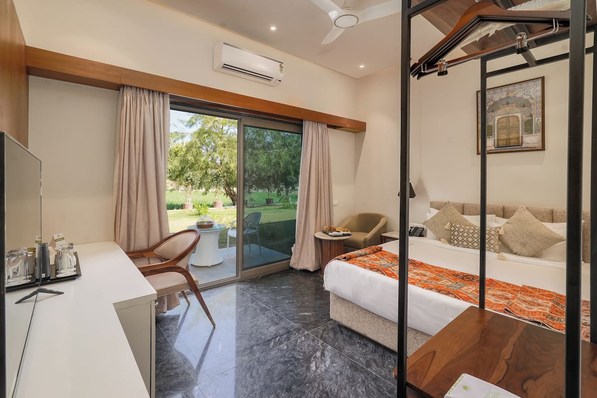 Quarto Duplo Deluxe, vista para o jardim | 1 quarto, cofre no quarto, quartos insonorizados