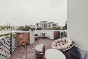 Quarto duplo superior, vista para o jardim | Terraço/pátio