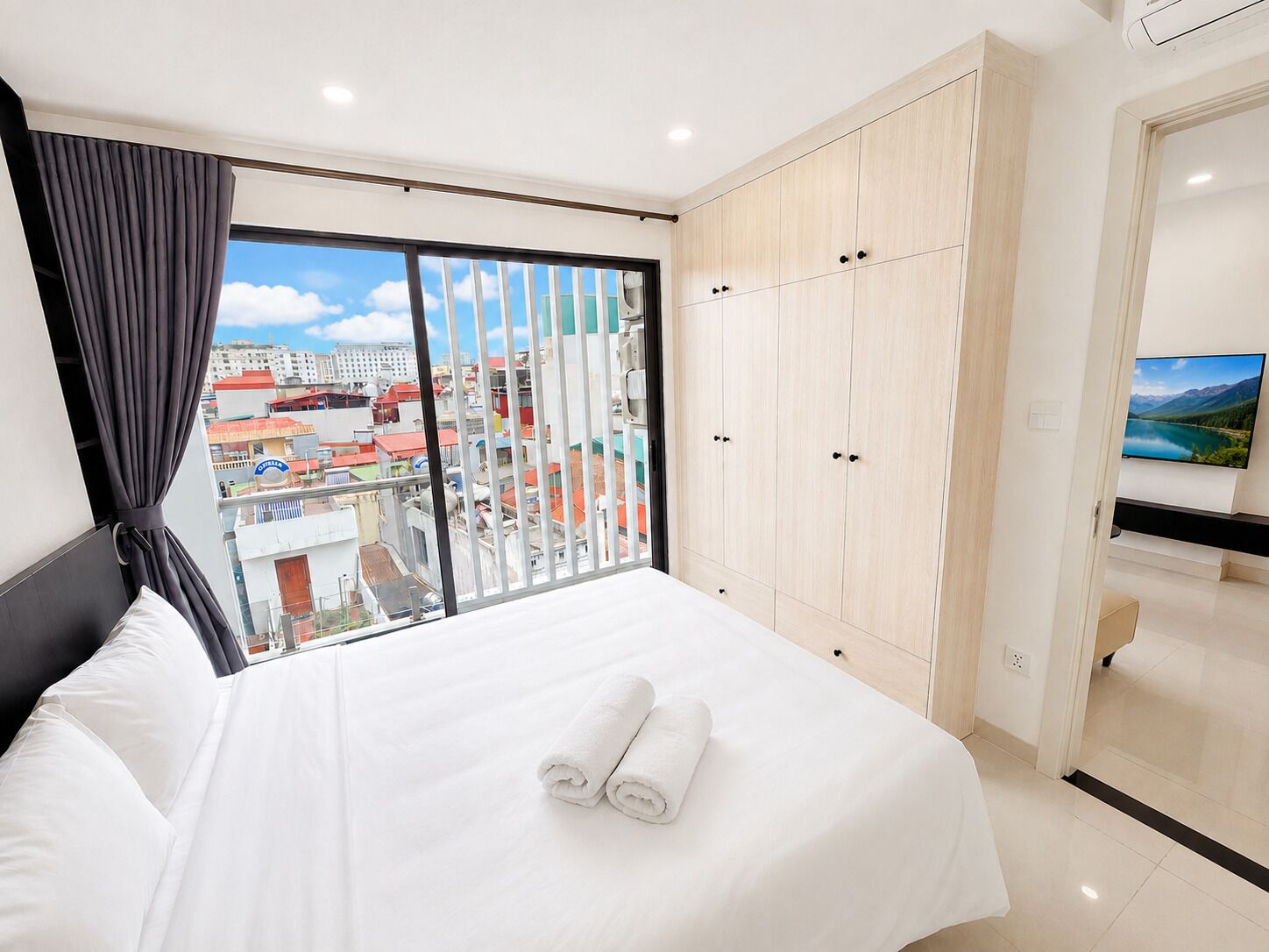 Apartamento Familiar, varanda, Vista para a cidade | Cofre no quarto, secretária, cortinas/cortinados opacos, Wi-fi grátis 