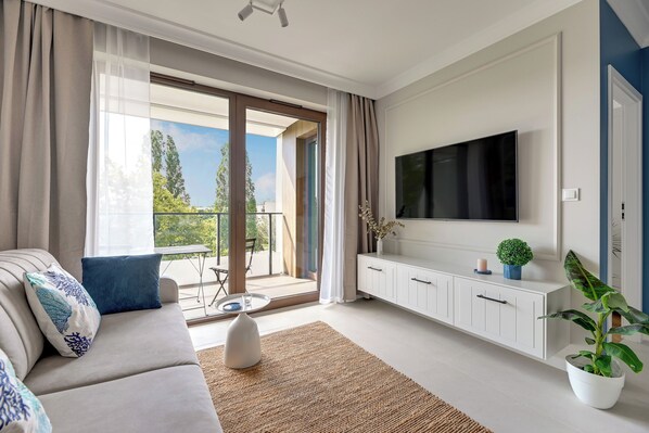 Apartamento luxo, vista para a cidade | Sala de estar