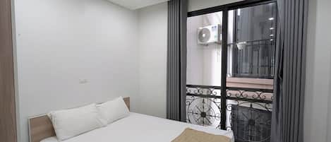 Apartamento Deluxe, Vista para a cidade | Sala de estar
