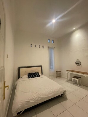 Quarto casal standard | Roupas de cama premium, Wi-Fi de cortesia, roupa de cama