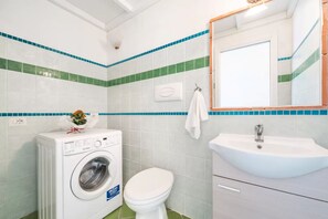 Apartamento, 1 quarto, varanda, vista para o oceano | Lavandaria