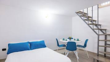 Apartamento básico | Área de estar | TV LED 32 polegadas com canais digitais