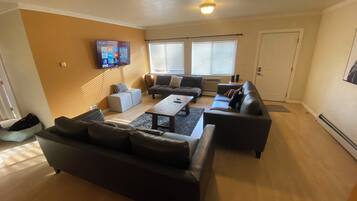 Apartamento Deluxe | Sala de estar