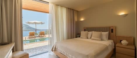 Quarto Premium, vista para o mar | Minibar com produtos grátis, cofre no quarto, Wi-fi grátis