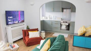 Apartamento | Área de estar | TV