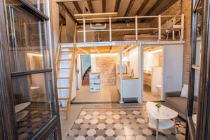 Loft, vista para a cidade | Área de estar