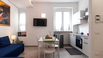 Apartamento | Área de estar | TV de tela plana