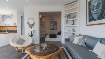 Apartamento Comfort | Sala de estar | Televisor