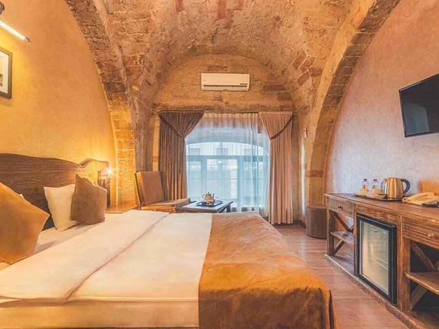 Quarto Deluxe, Vista para a cidade | Roupa de alta qualidade, camas de colchão Select Comfort, minibar