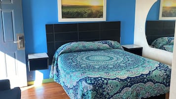 Quarto básico | Ferros/tábuas de passar roupa, Wi-Fi de cortesia, roupa de cama