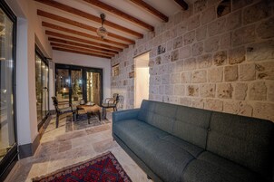 Quarto luxo | Área de estar