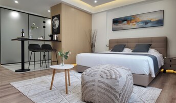 Camas com colchões pillow-top, frigobar (abastecido com itens grátis)