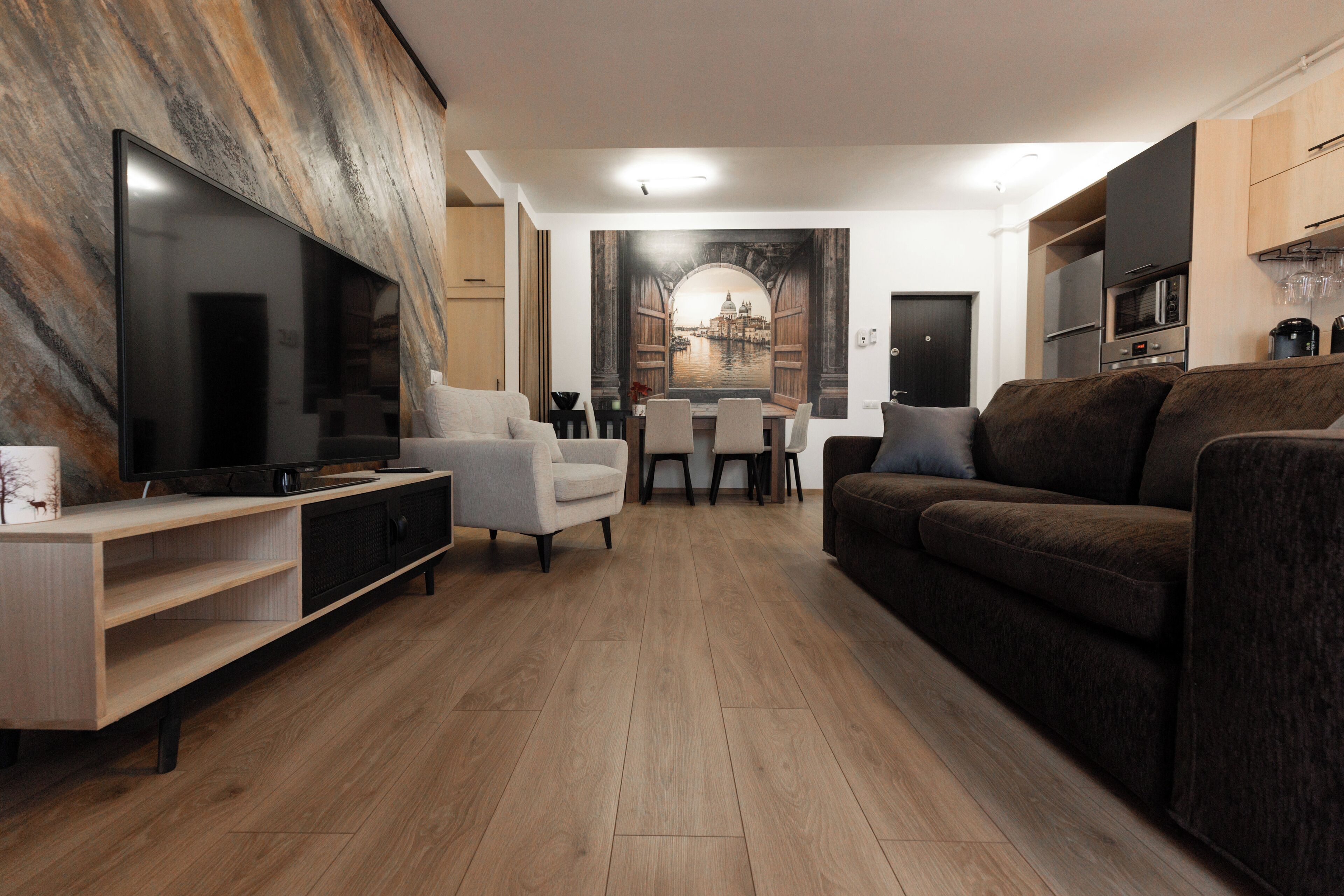 Apartamento conforto | Área de estar | TV de tela plana