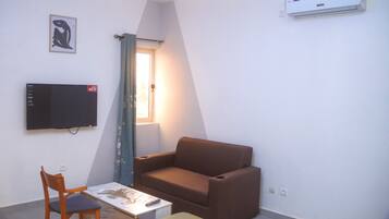 Estúdio Deluxe, varanda | Sala de estar