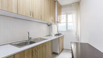 Apartamento, 2 quartos, varanda, vista para o jardim | Interior