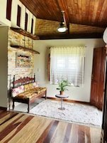Suite Comfort, 1 cama queen-size e sofá-cama, vista para o jardim | 1 quarto, secretária, secretária adequada para computadores portáteis