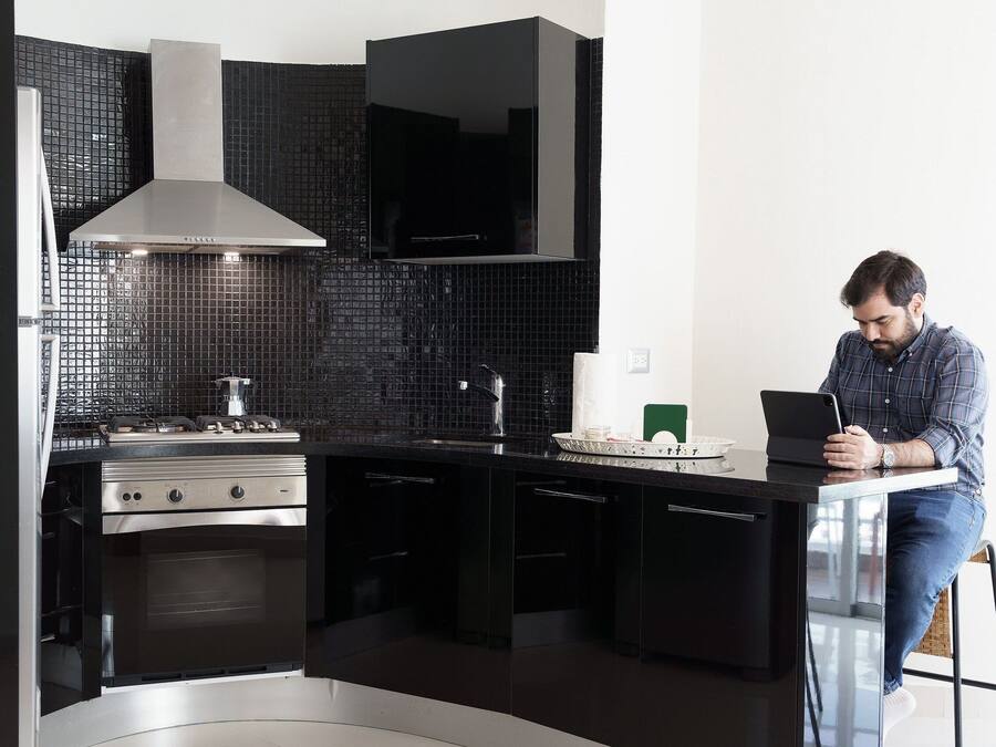 Apartamento Deluxe | Cozinha privada | Um frigorífico, um micro-ondas, uma torradeira, liquidificador