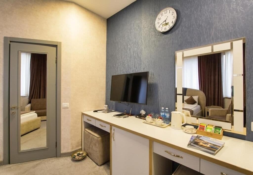 Quarto Duplo Deluxe, Vista para a cidade | Roupa de alta qualidade, minibar, cofre no quarto 
