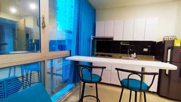 Apartamento Comfort | Sala | TV de ecrã plano