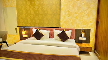 Quarto casal executivo | Camas Select Comfort, quartos à prova de som, roupa de cama