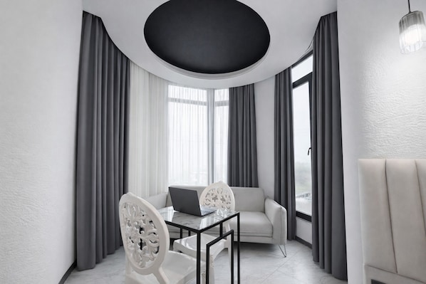 Quarto Duplo Deluxe | Sala de estar