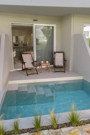 Suite Júnior, 2 camas individuais | Minibar, Wi-fi grátis, roupa de cama fornecida . Golden Coast Suites