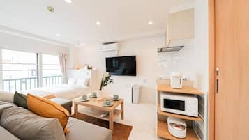 Apartamento Empresarial, várias camas, Vista para a cidade | Roupa de alta qualidade, edredões de penas, secretária