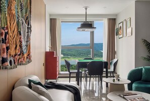 Suíte estúdio exclusiva, vista para a cidade | Sala de estar