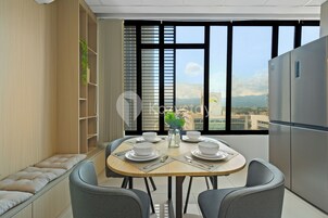 Apartamento, 1 quarto, Vista para a cidade | Sala de jantar