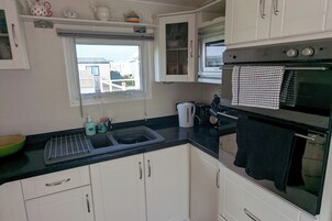 Cabine | Cozinha privada | Um frigorífico, um micro-ondas, um forno, uma placa de cozinha