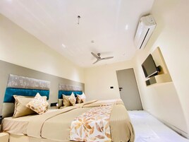 Quarto Duplo ou Twin Familiar, 1 quarto, Vista para a cidade | Quartos insonorizados, ferro/tábua de engomar, roupa de cama fornecida 