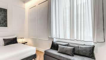 Quarto Quádruplo Deluxe, Vista para a cidade | Secretária, quartos insonorizados, Wi-fi grátis