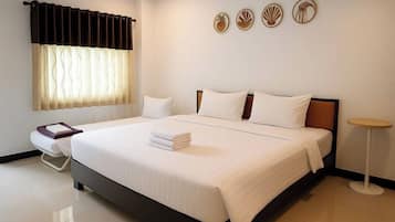 Quarto triplo | Escrivaninha, Wi-Fi de cortesia, roupa de cama