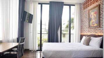 Estúdio Deluxe, varanda | 1 quarto, secretária, quartos insonorizados, Wi-fi grátis