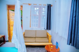 Quarto Duplo Comfort, 1 quarto, vista para a colina | Sala de estar
