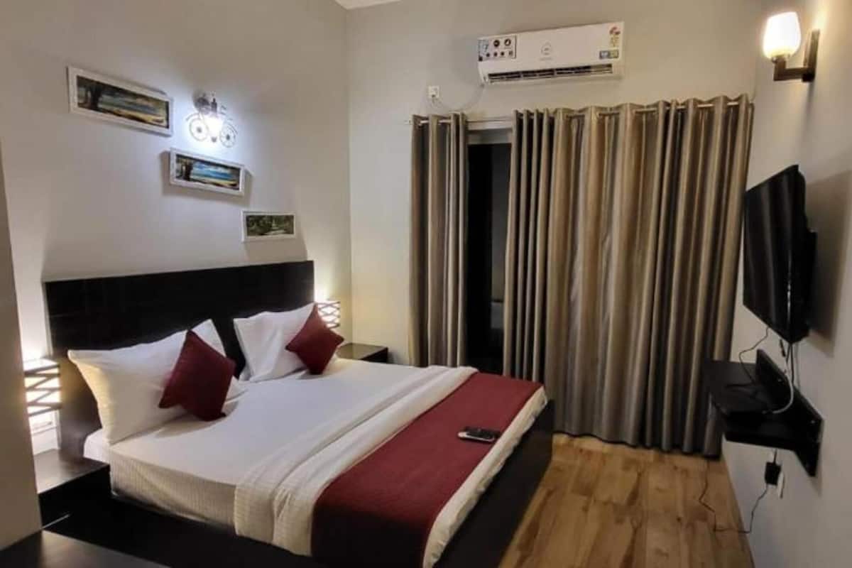 Quarto Duplo Deluxe, vista para o jardim | Vista do quarto