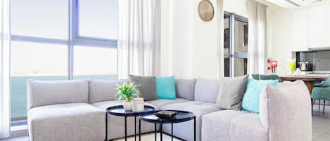 Suite-Estúdio Deluxe, Vista para a cidade | Sala de estar
