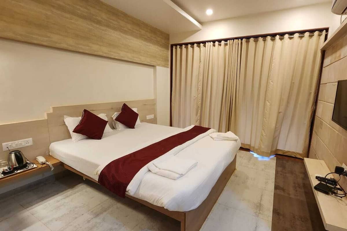 Quarto Deluxe, Vista para a cidade | 1 quarto, Wi-fi grátis