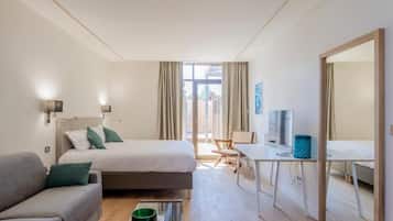 Suite Deluxe, Vista para a cidade | 1 quarto, roupa de alta qualidade, secretária