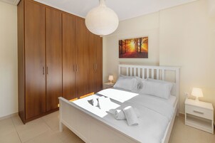 Apartamento família, 2 quartos, cozinha, vista para a montanha | 2 quartos, individualmente decorados, individualmente mobiliados