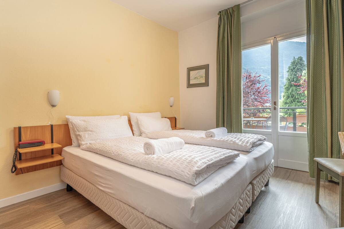 Quarto Duplo ou Twin Standard, varanda, vista para o lago | Wi-fi grátis 