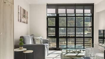 Apartamento | Área de estar | TV de tela plana