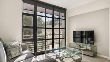 Apartamento | Área de estar | TV de tela plana