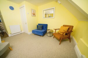 Apartamento Familiar, vista para o rio | Sala